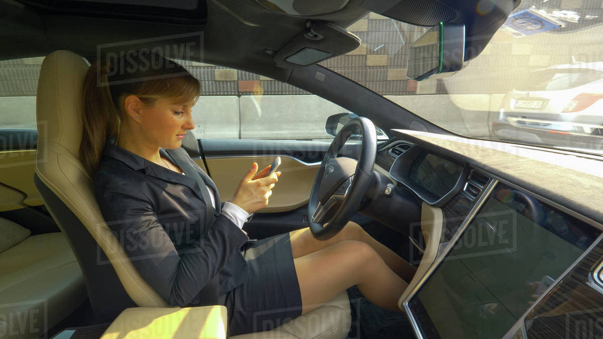 AUTONOMOUS TESLA CAR, MARCH 2018 - CLOSE UP: Young Caucasian ...