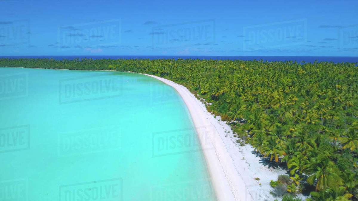 AERIAL: Spectacular tropical island sandy shore stretches into the ...