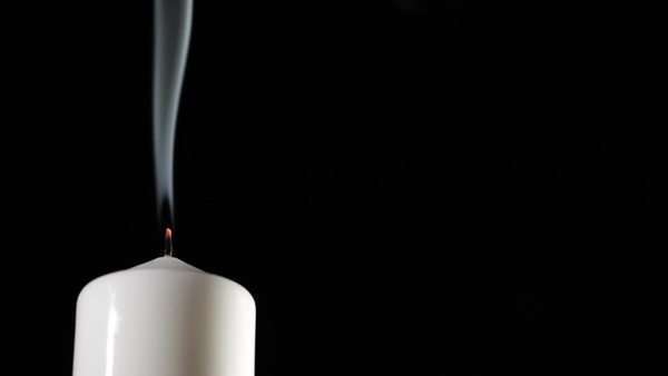 Extinguished candle with smoke - Stock Video Footage - Dissolve