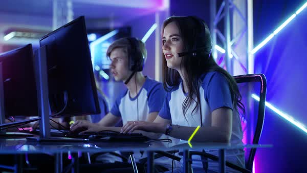 Beautiful Professional Gamer Girl and Her Team Participate in eSport ...