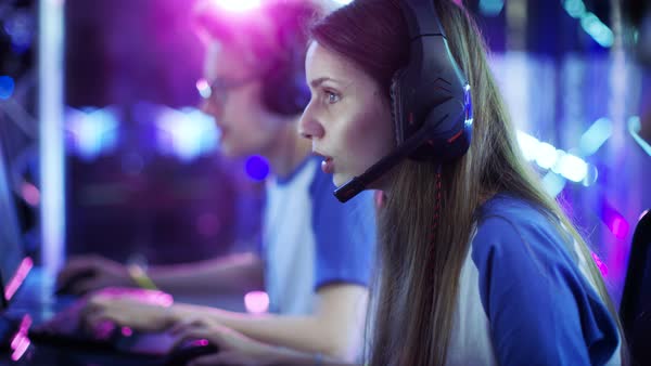 Beautiful Professional Gamer Girl and Her Team Participate in eSport ...