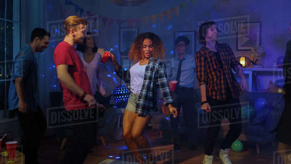 Friends dance together at a college party. - Royalty-free Stock Photo ...