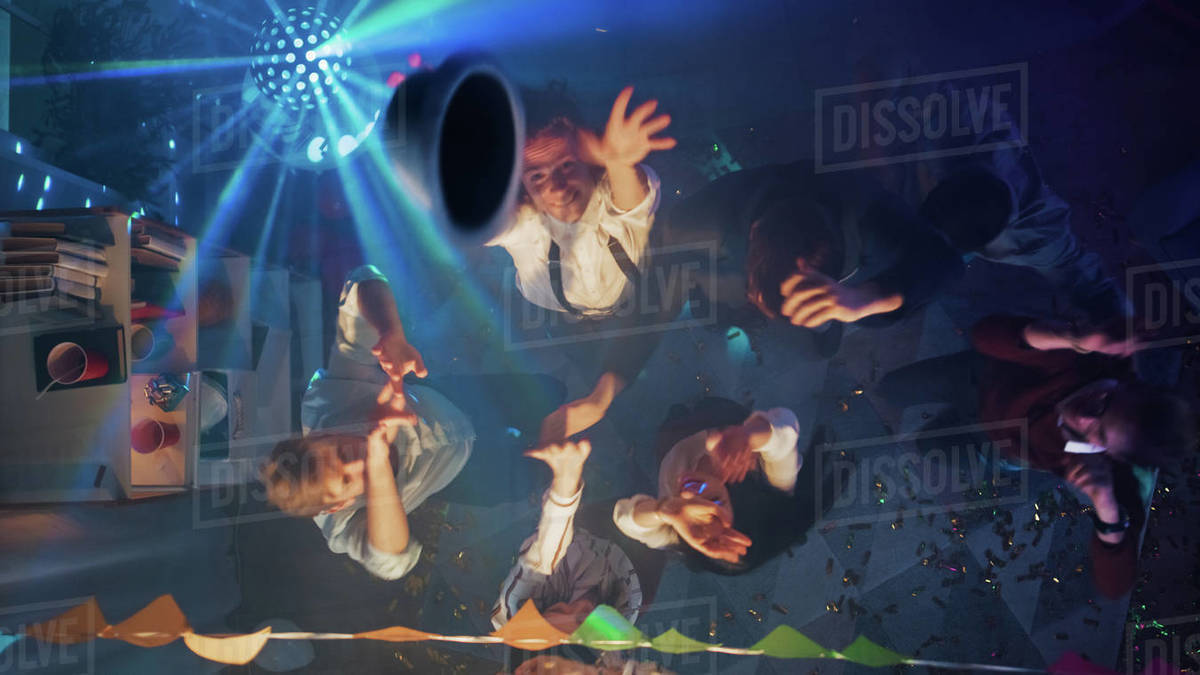 A group of friends dance together at a college party. - Royalty-free ...