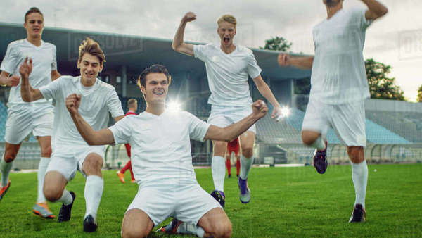 Captain of the Soccer Team Stands on His Knees Celebrates Awesome ...