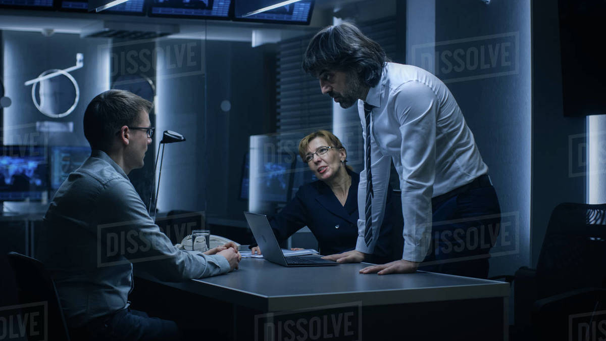 Male and Female Special Service Agents Interrogate Young Suspect in ...