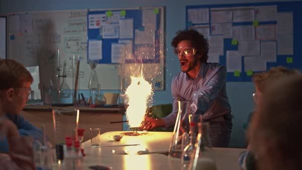 Elementary School Chemistry Classroom: Engrossed Children Watch How ...