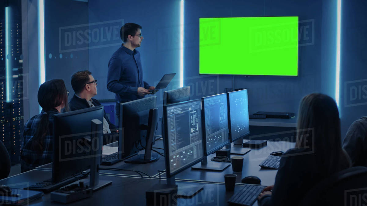 Team of Professional IT Developers Have a Meeting, Speaker Talks about ...