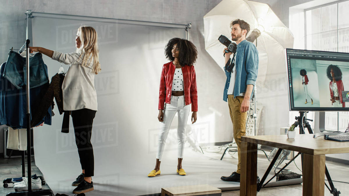 Backstage of the Photo Shoot: Stylist Chooses Outfit and Clothes for a ...