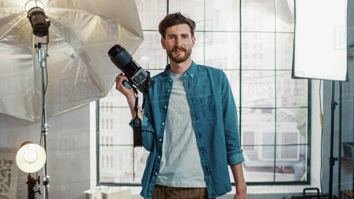 In the Photo Studio with Professional Equipment: Portrait of the ...