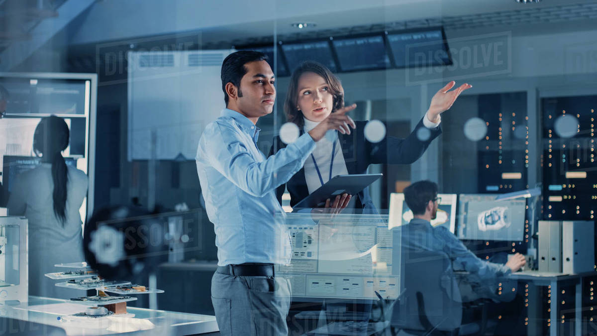 In Technology Research Facility: Female Project Manager Talks With ...