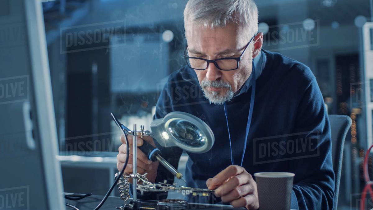 Electronics Maintenance Engineer Enters His Workshop with Coffee ...
