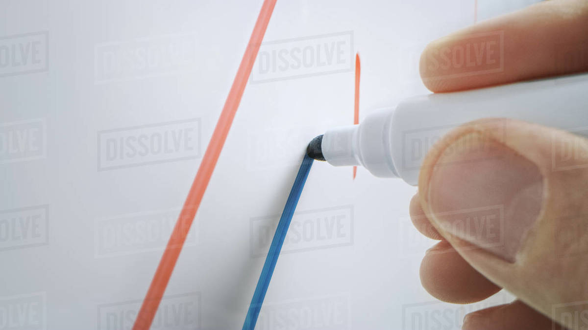 Macro Shot of a Blue Marker Pen Being Held with a Hand. Person Drawing ...
