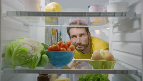 Camera Inside Kitchen Fridge: Man Opens Fridge Door, Looks inside and ...