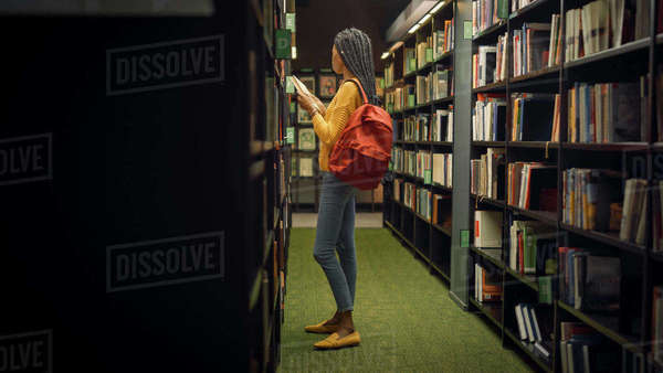 University Library: Portrait of Gifted Beautiful Girl Stands Between ...