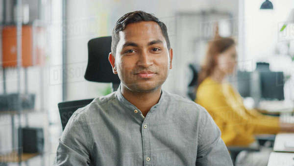 Portrait of Handsome Professional Indian Man Working at His Desk, Using ...