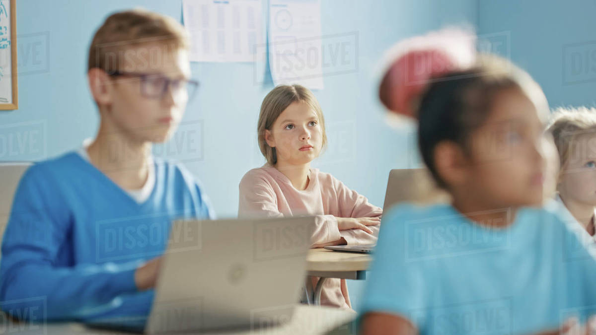 Elementary School Computer Science Class: Cute Girl Uses Digital Tablet ...