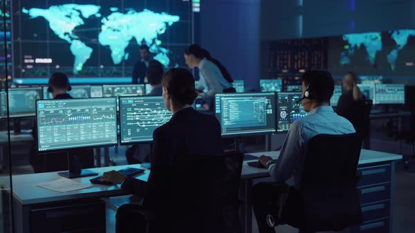 Team of Professional Computer Data Science Engineers Work on Desktops ...