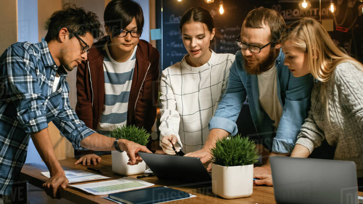 Late at Night Team of Young Creative Developers Have Brainstorming ...