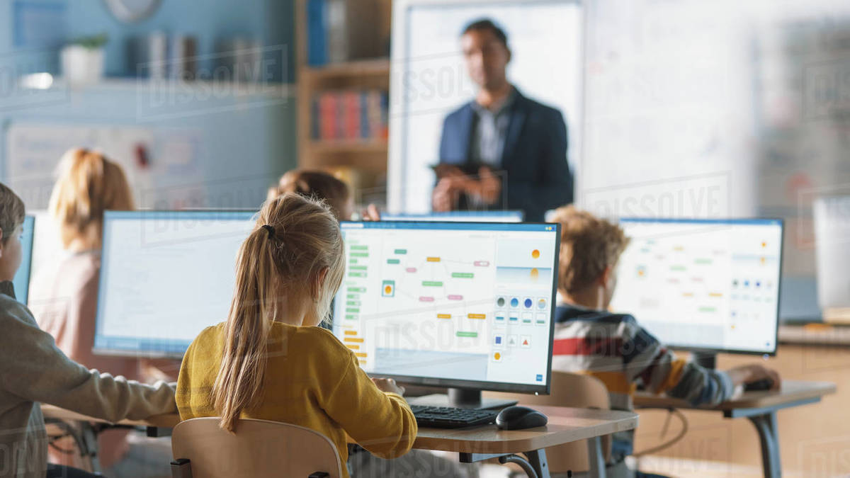 Elementary School Computer Science Class: Teacher Uses Digital Tablet ...