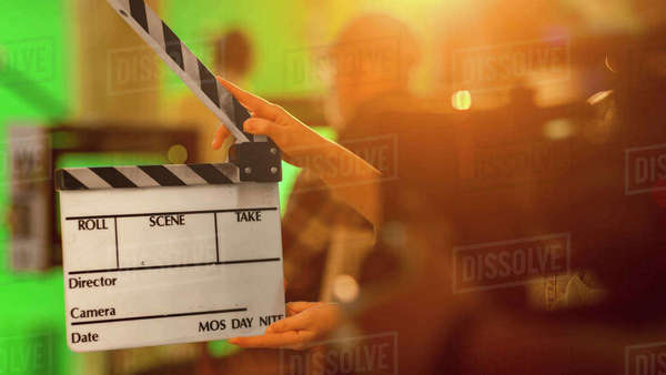 Close up Shot On Film Studio Set Young Camera Assistant Holds Empty ...