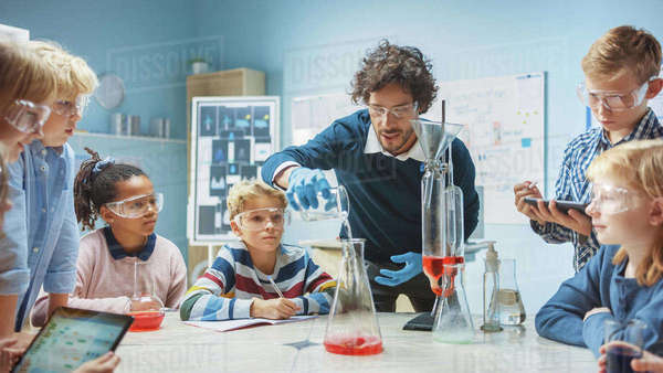 Elementary School Chemistry Classroom: Enthusiastic Teacher Teaches ...