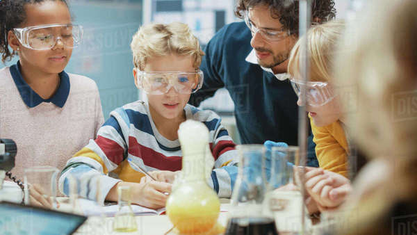 Elementary School Science Classroom: Enthusiastic Teacher Explains ...