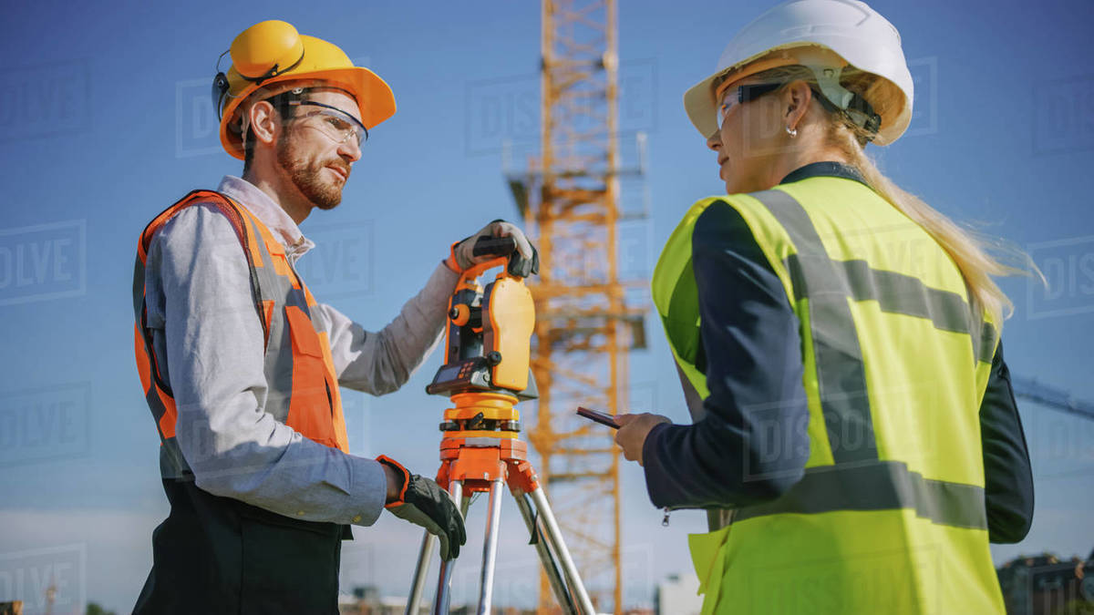 Construction Worker Using Theodolite Surveying Optical Instrument for ...