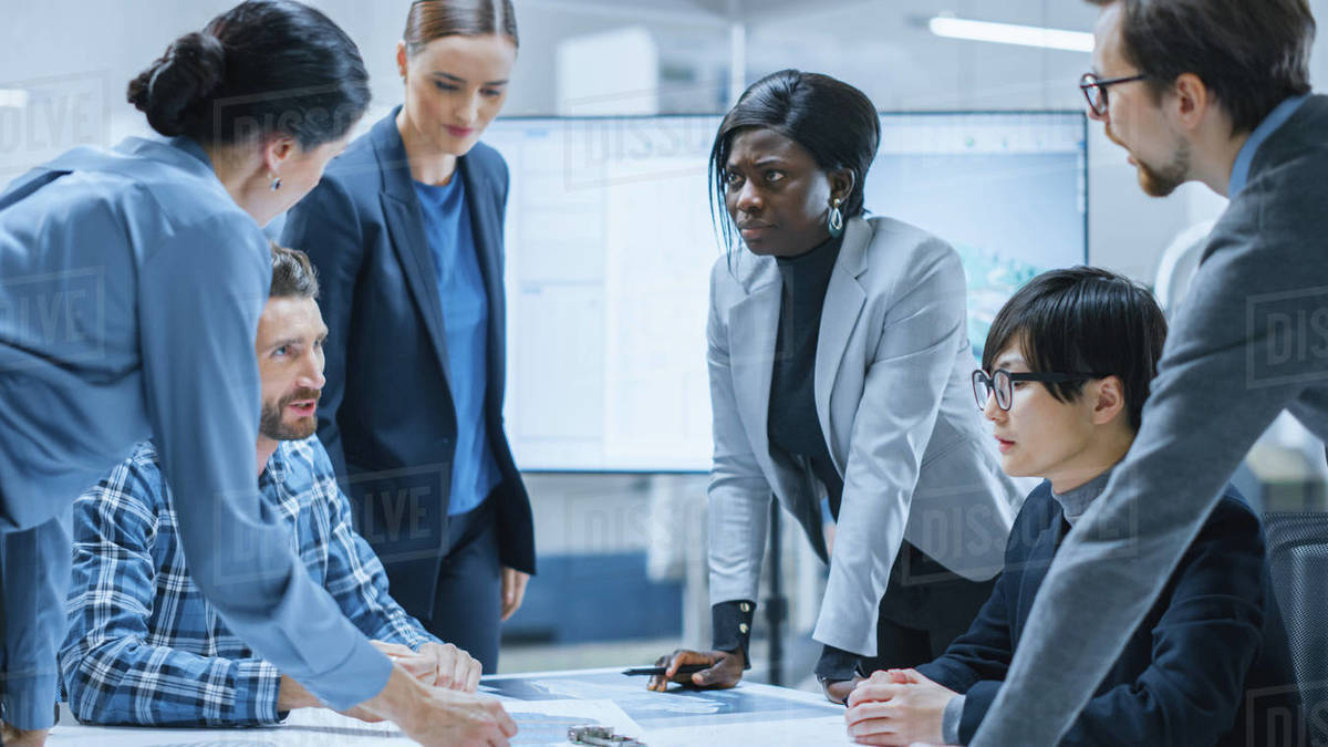 Busy Diverse Team of Computer Engineers and Specialists Gather Around ...