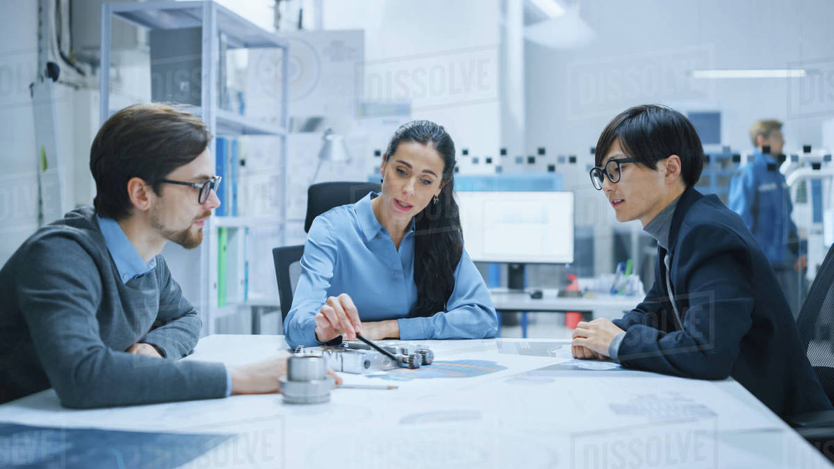 Diverse Team of Computer Engineers and Specialists Gather Around ...
