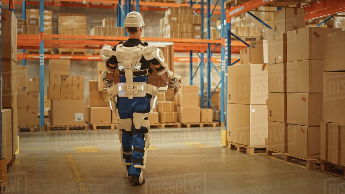 High-Tech Futuristic Warehouse: Worker Wearing Advanced Full Body ...