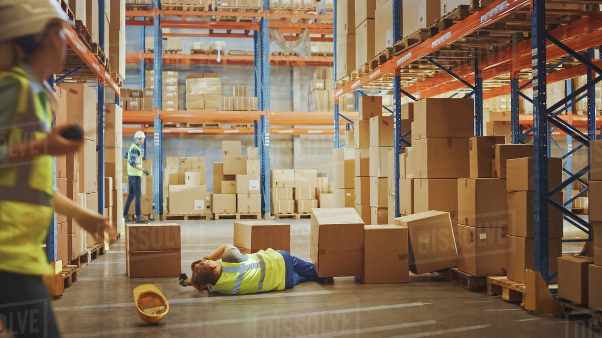 Warehouse Worker Has Work Related Accident Falls while Trying to Pick ...
