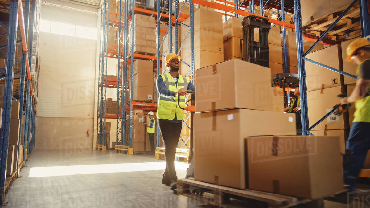 Retail Delivery Warehouse full of Shelves with Goods in Cardboard Boxes ...