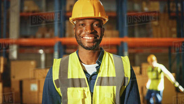 Handsome and Happy Professional Worker Wearing Safety Vest and Hard Hat ...