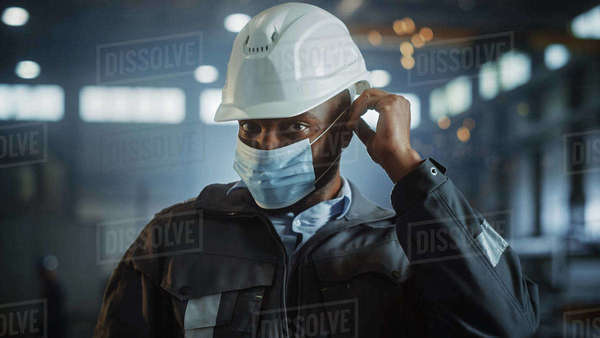 Professional Heavy Industry Engineer/Worker is Putting On Safety Face ...