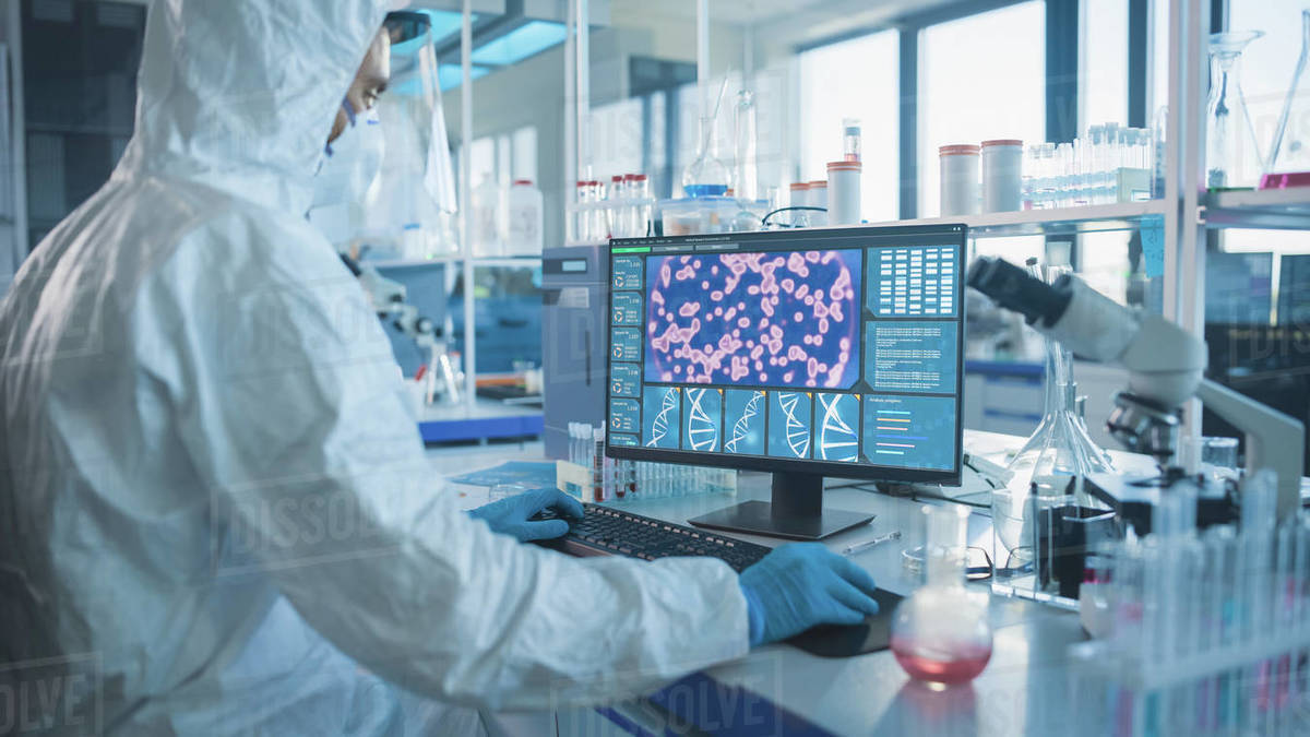 Microbiology Scientist Typing on Keyboard on Computer - Stock Photo ...