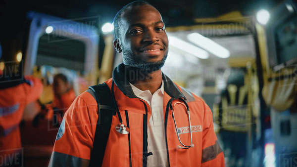 Male Paramedic Proudly Standing - Royalty-free Stock Photo | Dissolve