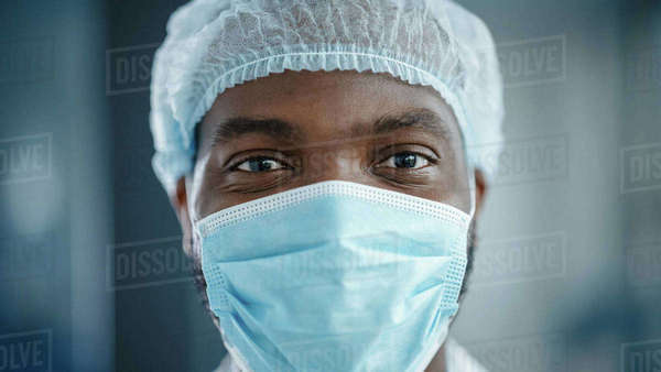 Close Up Portrait of a Male Doctor or Surgeon Wearing a Protective Face ...