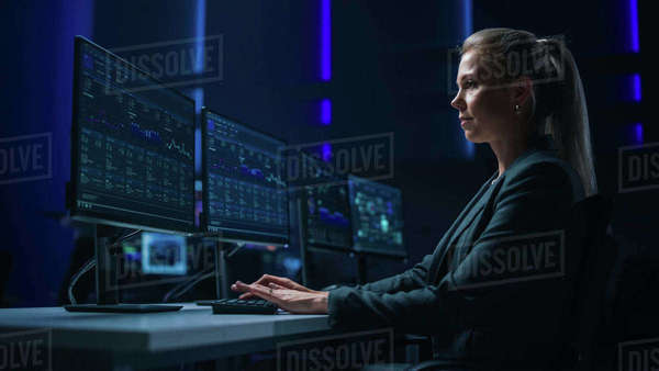 Confident Female Data Scientist Works on Personal Computer in Big ...