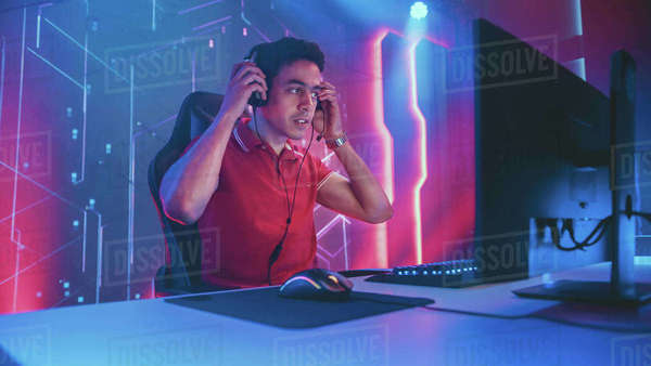 Professional eSports Gamer Sitting at Gaming Stations - Stock Photo ...