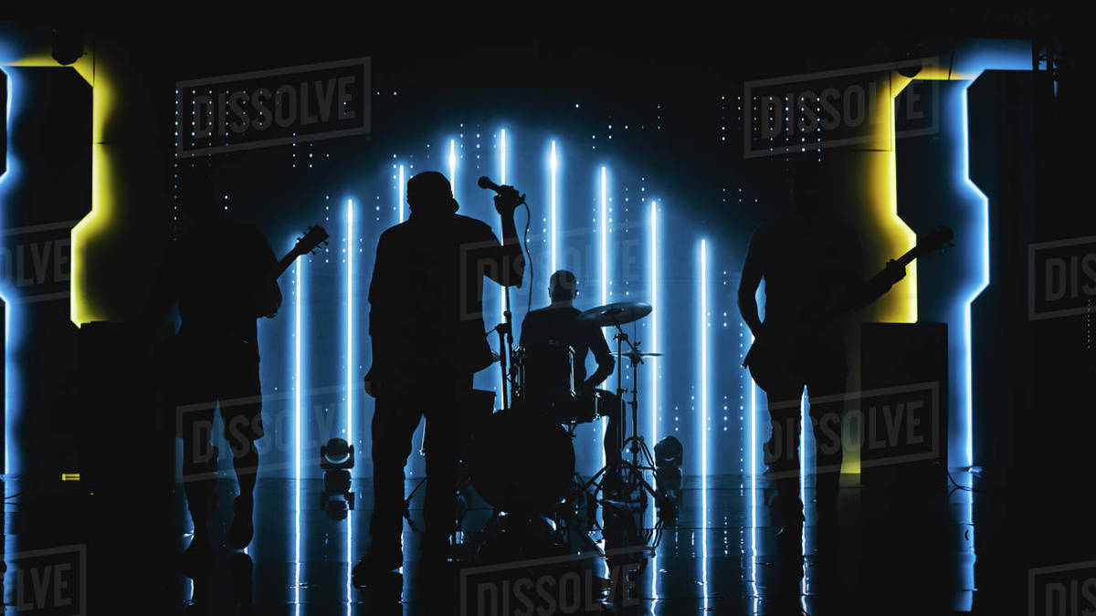 Four Man Rock Band with Lead Singer, Guitarists, Bassist and Drummer ...