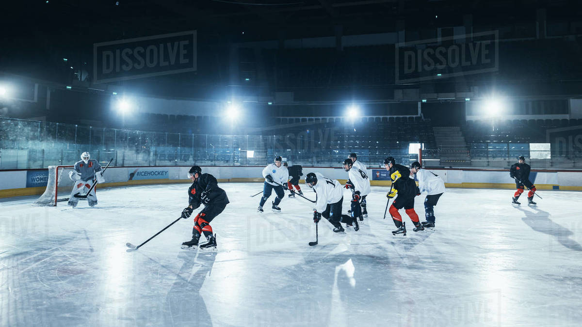 Ice Hockey Rink Arena: Professional Forward Player Breaks Defense ...