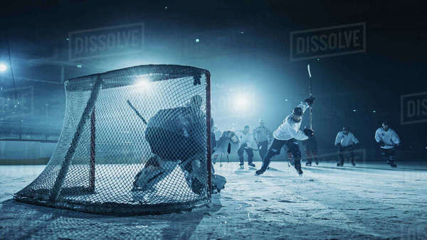 Ice Hockey Game in Rink Arena: Forward Player who Does Slapshot, Shoots ...