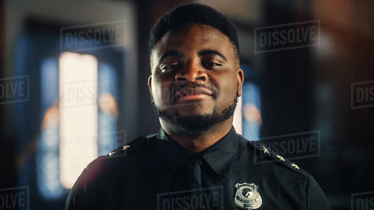 Black Policeman in Universal Uniform Smiling at Camera - Royalty-free ...