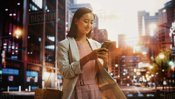 Portrait of an Japanese Female Wearing Smart Casual Clothes and Using ...