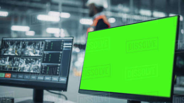 Vehicle Factory Line Operator Working at Desk with Computer with Green ...