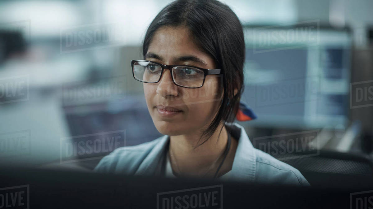 Diverse Office: Portrait of Confident Indian IT Programmer Working on ...