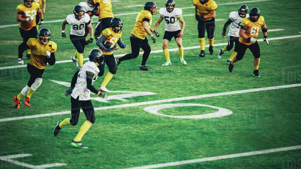 American Football Field Two Teams Compete - Stock Photo - Dissolve