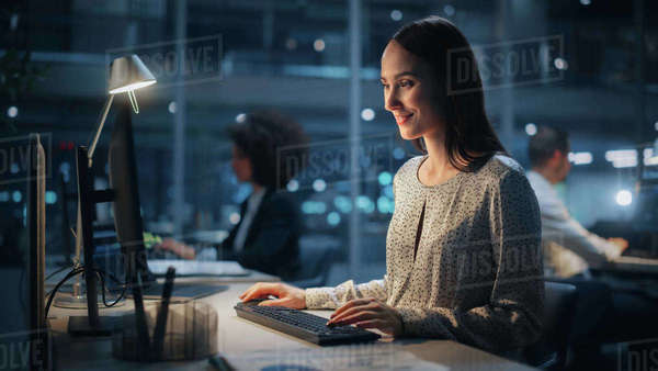 Portrait of Confident Female Manager Using Computer - Royalty-free ...