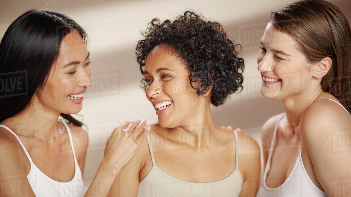 Portrait of Three Diverse Multiethnic Models - Stock Photo - Dissolve