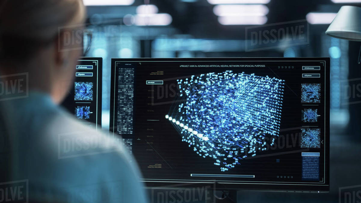 Female Technical Operator Works at Her Workstation with Multiple ...